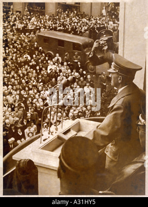 Adolf Hitler, speaking from the balcony of the Fuehrerhaus, Munich ...