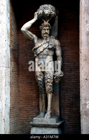 Figure of a Satyr Half Man Half Goat standing in an alcove in the ...