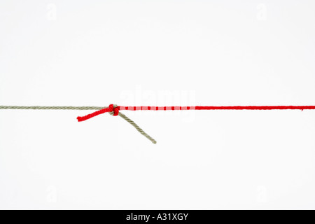 Two stands of wool tied together Stock Photo - Alamy