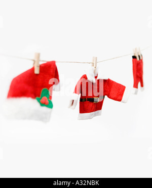 Santa's hat hanging on a washing line Stock Photo - Alamy