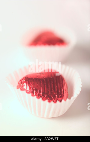 Chocolate red heart sweets for Valentine's Day on a white background in ...