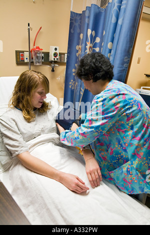 Teenage Girl Prepares for Surgery Stock Photo - Alamy