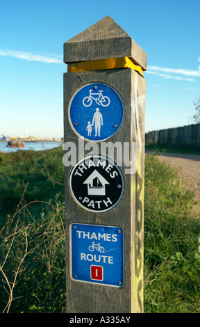 Thames Path and cycle route at Woolwich with distant views of Canary ...