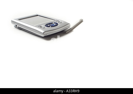PDA face up with pen on white background Stock Photo - Alamy