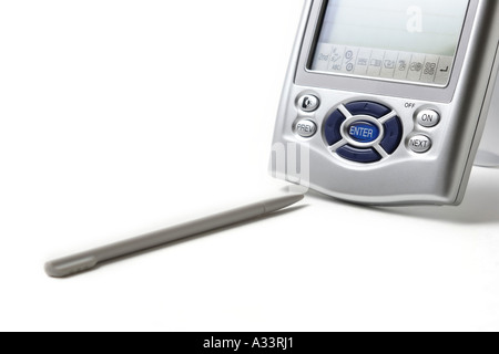 PDA face up with pen on white background Stock Photo - Alamy