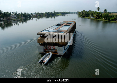 TRANSPORT BOAT MOVING THROUGH KUTTANAD BACKWATERS NEDUMUDI ALAPPUZHA ...