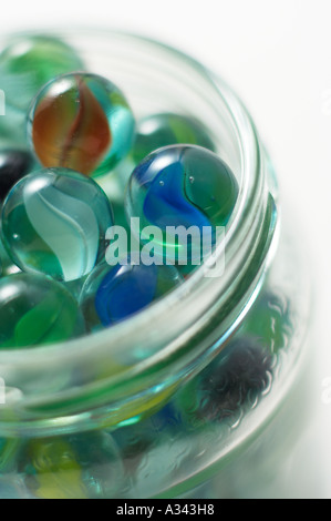Marbles in a jar Stock Photo - Alamy