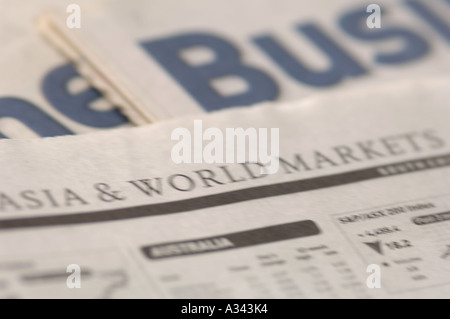 business newspaper with world market charts Stock Photo - Alamy