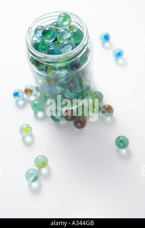Marbles in a jar Stock Photo - Alamy