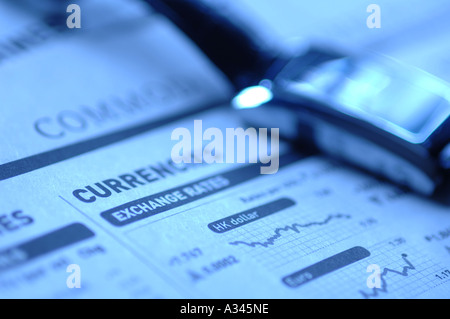 business, currencies chart newspaper with watch on the side Stock Photo ...