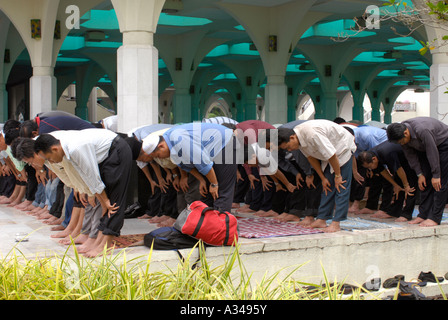 Malaysia Friday Prayer men praying in the street Jalan Masjid India and ...