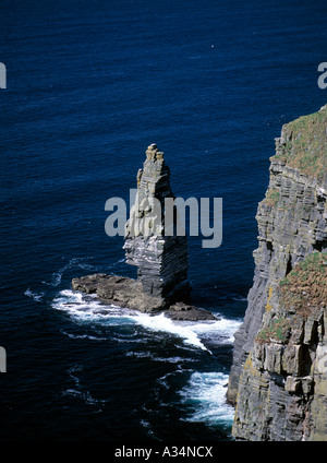 tall sea stacks coming upright out of the atlantic sea ocean, constant ...