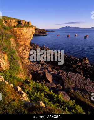 The Isle of Rum from the coastal cliff top walk below Beinn an Eòin on ...