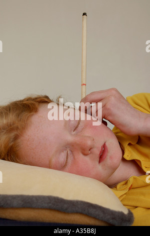 Hopi ear candle therapy Stock Photo - Alamy