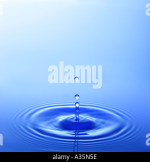 Clear water drop and splash motion catch Stock Photo - Alamy