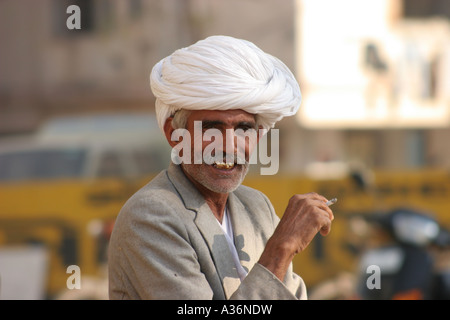 Indian man laughing. Colourful portrait, full frame photograph full of ...