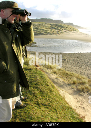 Bird watching on Islay Inner Hebrides Stock Photo - Alamy