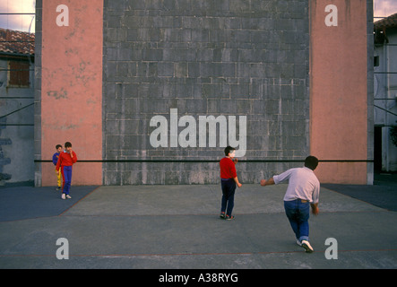 French Basque people man and boys playing handball pelota pilota in the ...