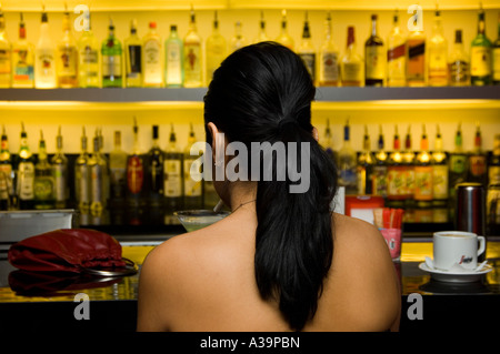 Rare view of a Hispanic lady in a pub Stock Photo - Alamy