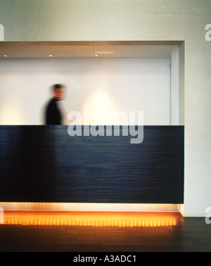 The man at the reception in the hotel Stock Photo - Alamy
