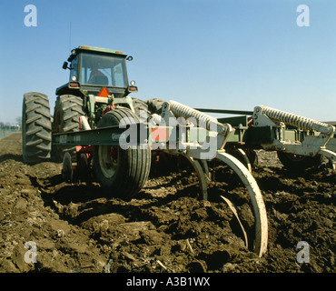 WORKING GROUND FOR CORN USING CHISEL PLOW AND DISK COMBINATION Stock ...