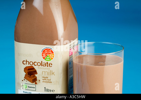 Chocolate flavoured milk package and glass with nutritional information ...