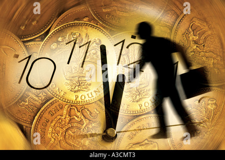 Businessman on clock face with Pound coins Stock Photo - Alamy