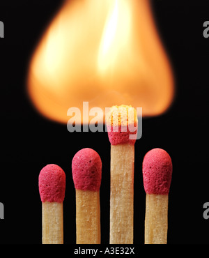 Flame of fire lit by matches Stock Photo - Alamy