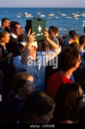 Man with first aid kit in the office Stock Photo - Alamy