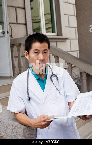 Taiwanese Doctor standing with stethoscope on Taiwan flag background ...