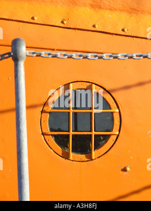 window on old syle lifeboat Stock Photo - Alamy