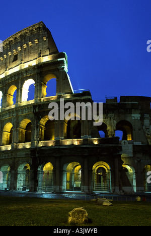 view of Colosseum illuminated at twilight in Rome, Italy Stock Photo ...