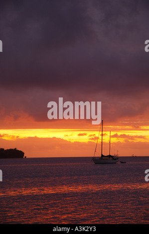 Sunset with a yacht over Port Vila harbour in Vanuatu Stock Photo - Alamy