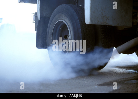 Diesel lorry starting up in early morning and belching smoke England ...
