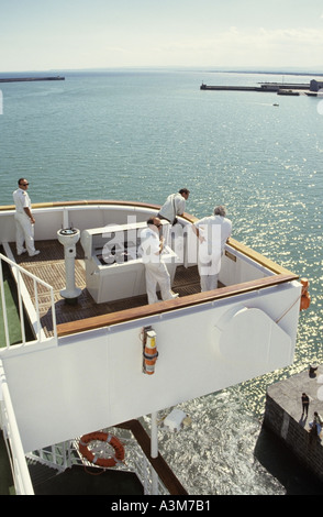 Pilot and Bridge deck officers working, as Cunard Liner QE2 berths at ...