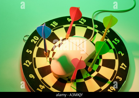 Computer Mouse and Darts on Dart Board Stock Photo - Alamy