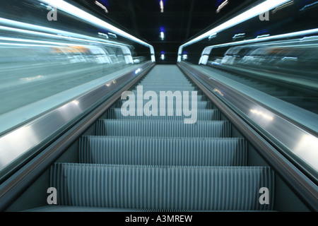 A modern escalator path with illuminated lights Stock Photo - Alamy