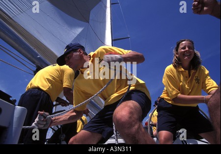 Teamwork onboard a sailing yacht racing in a regatta Stock Photo - Alamy