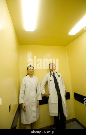 Young man doctor in medical concept Stock Photo - Alamy