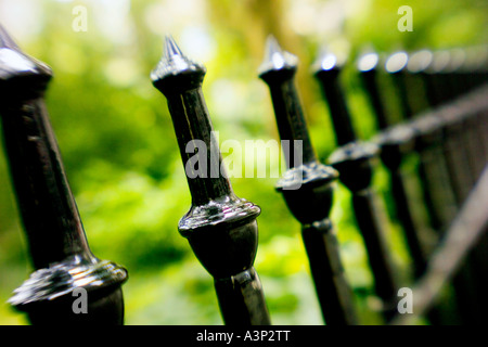 Wrought iron fence with spikes Stock Photo - Alamy
