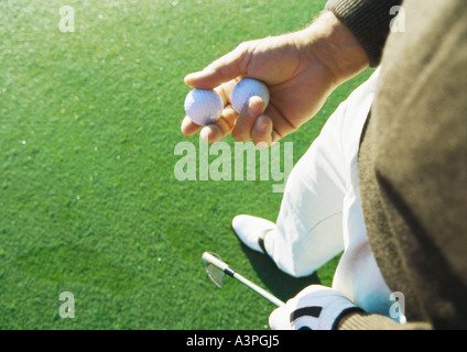 High angle view of golf ball on grass Stock Photo - Alamy