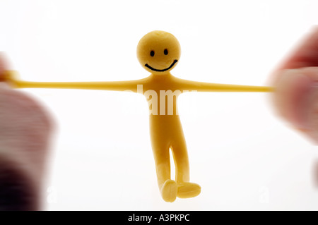 Small man, smiley face, bendy, smiling yellow man Stock Photo - Alamy