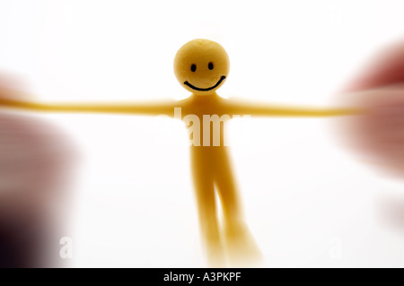 Small man, smiley face, bendy, smiling yellow man Stock Photo - Alamy