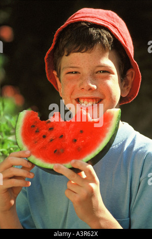 Funny Male face with watermelon, close up. Excited crazy man jump with ...