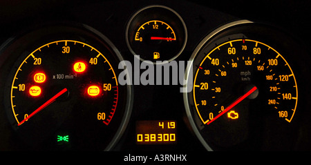 Fuel Dashboard Gauge Showing a Full Tank in front of Red Metal Jerrycan ...
