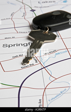 Car remote key on map and rental agreement Stock Photo - Alamy