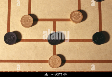Nine Men's Morris Board Game and Pieces Stock Photo - Alamy