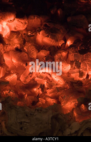 Burning logs alight inside a wood burning stove Stock Photo - Alamy