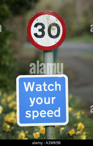 Speed restriction signs with added warnings in a Warwickshire village ...