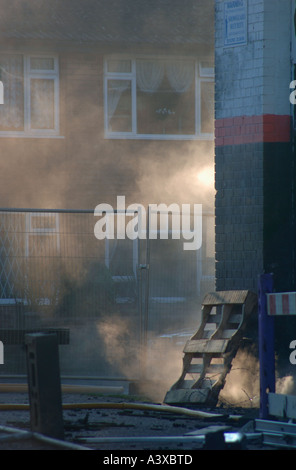 Smoke Escaping From A Burning Building Stock Photo - Alamy